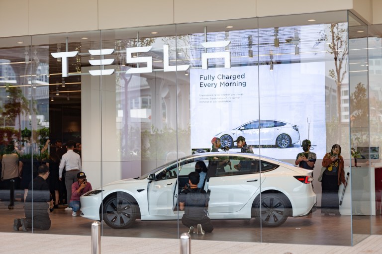 New Tesla Model 3 Debuts Alongside First Flagship Experience Centre in ...